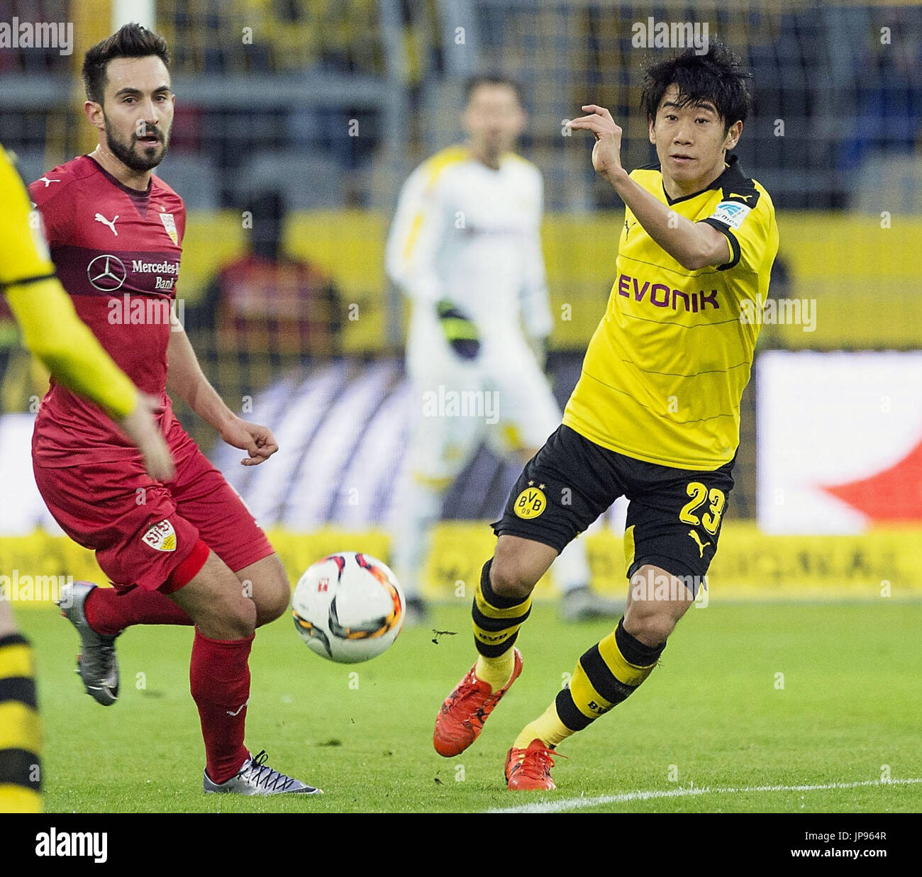 Shinji Kagawa (R) of Borussia Dortmund plays in the first half of a ...