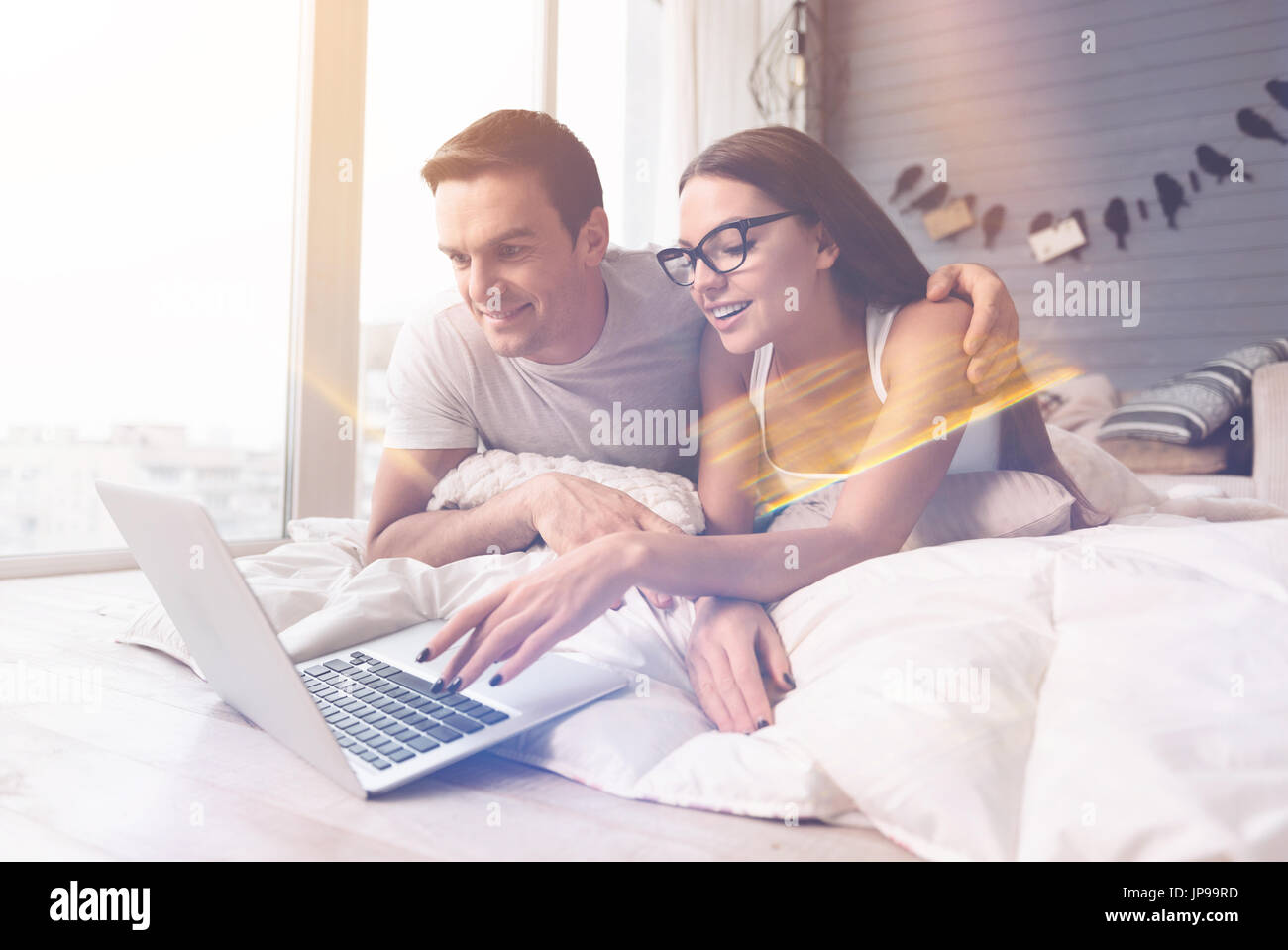 Side view delighted couple hi-res stock photography and images - Alamy