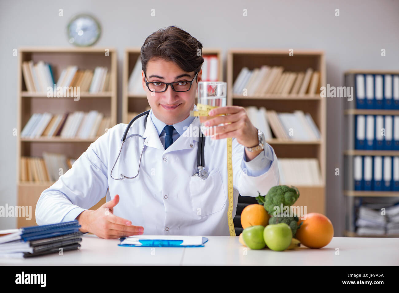 Scientist studying nutrition in various food Stock Photo - Alamy