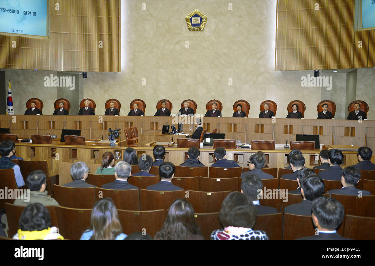 South Korea's Supreme Court judges sit to hand down a ruling for the ...