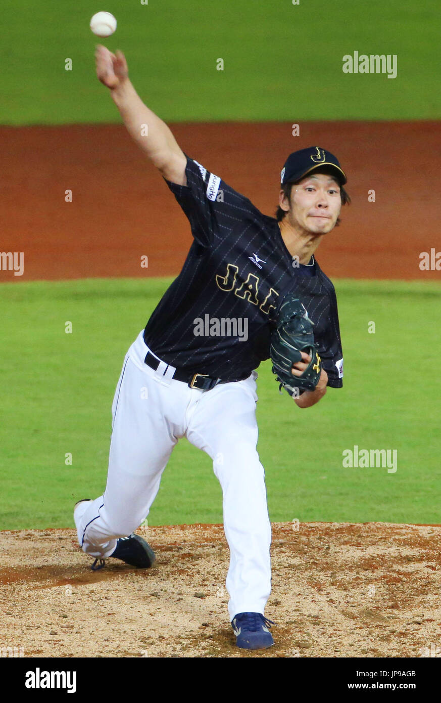 Japan starter Shota Takeda pitches during a WBSC Premier 12 baseball ...