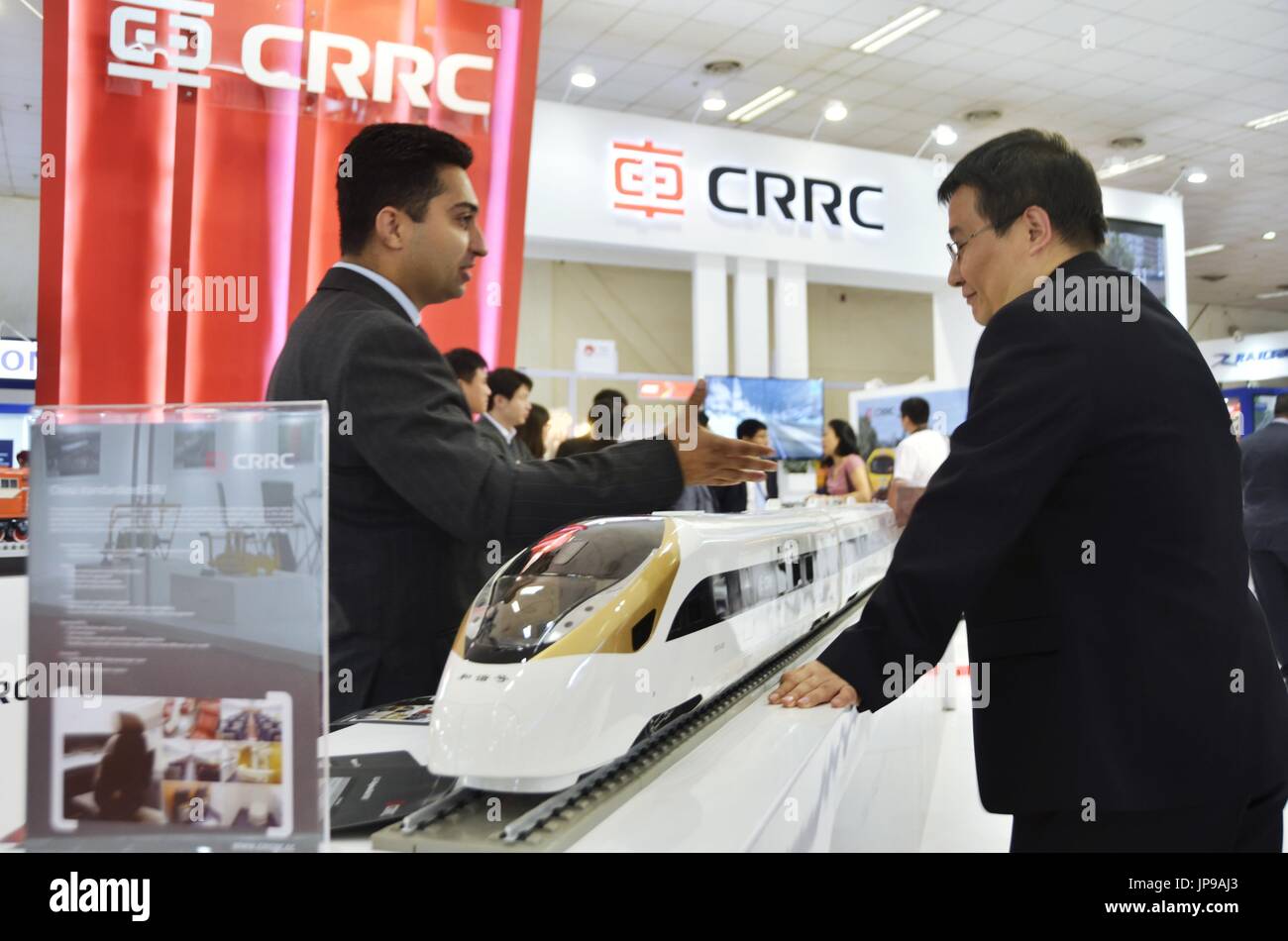 A high-speed train model is on display in a Chinese rolling stock maker ...