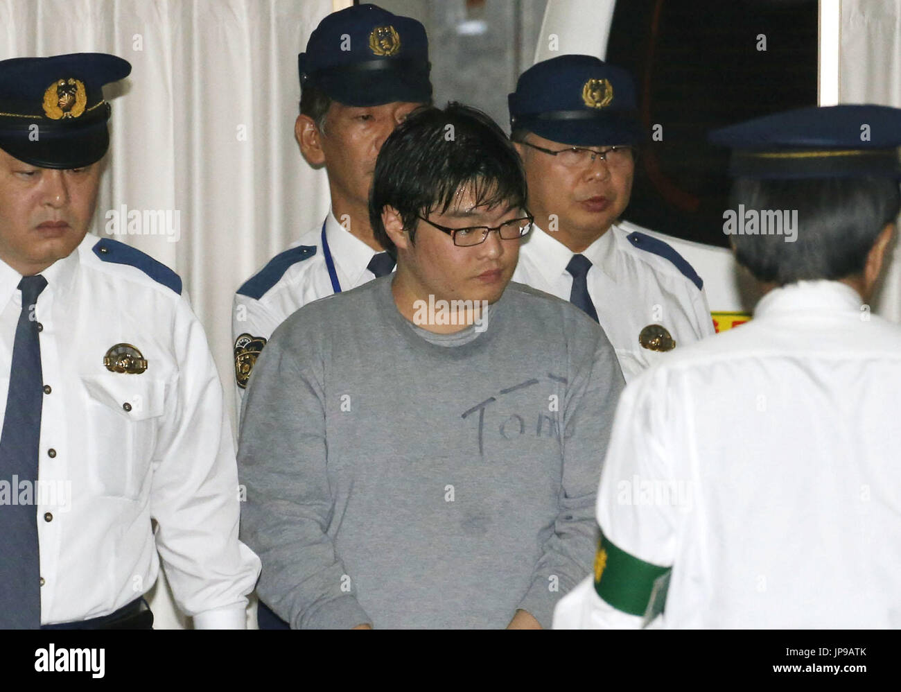 Masahiro Aoki, who has been arrested for allegedly killing a 17-year-old woman in Tokyo, leaves ...