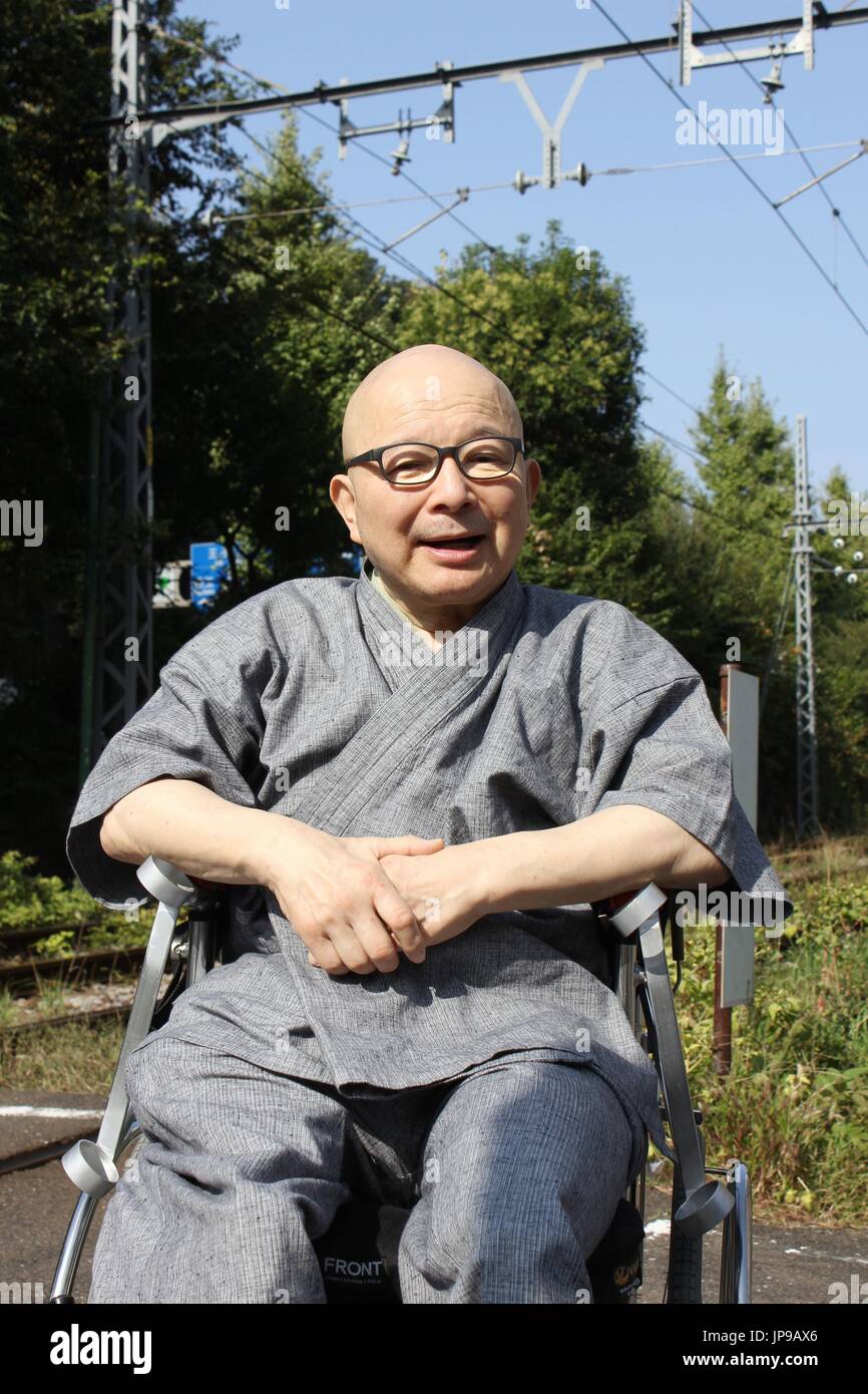Photographer Naotake Fukuda speaks in an interview in Tokyo on Oct. 24 ...