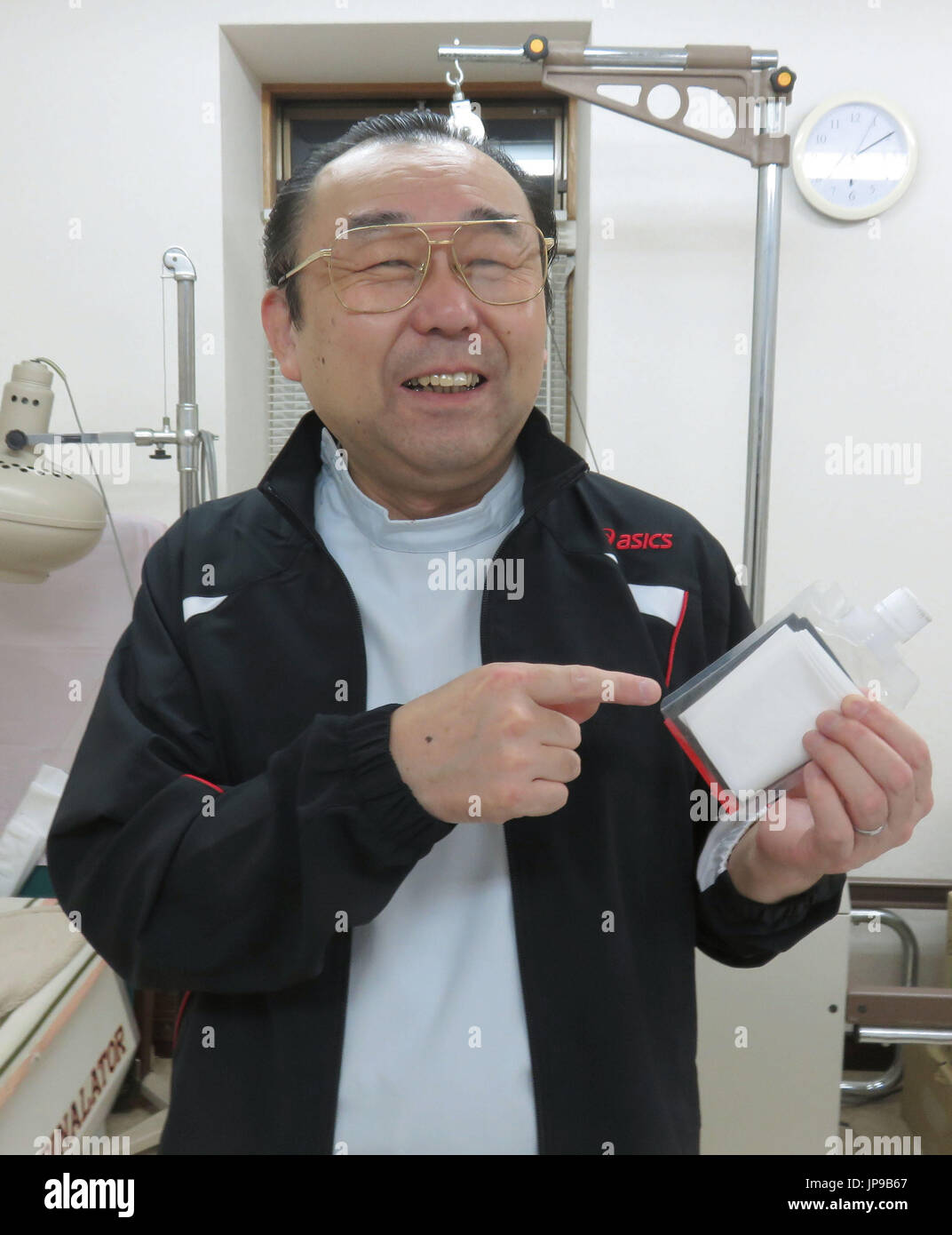 Undated photo shows blind acupuncturist Isamu Yoshida, who has developed an inflatable emergency ...