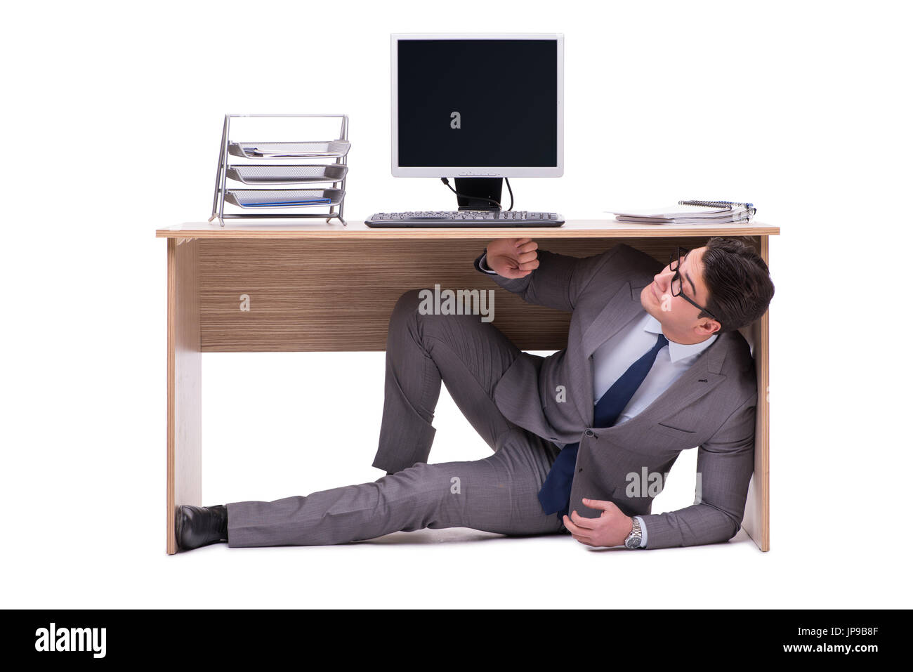 Person hiding under desk hi-res stock photography and images - Alamy