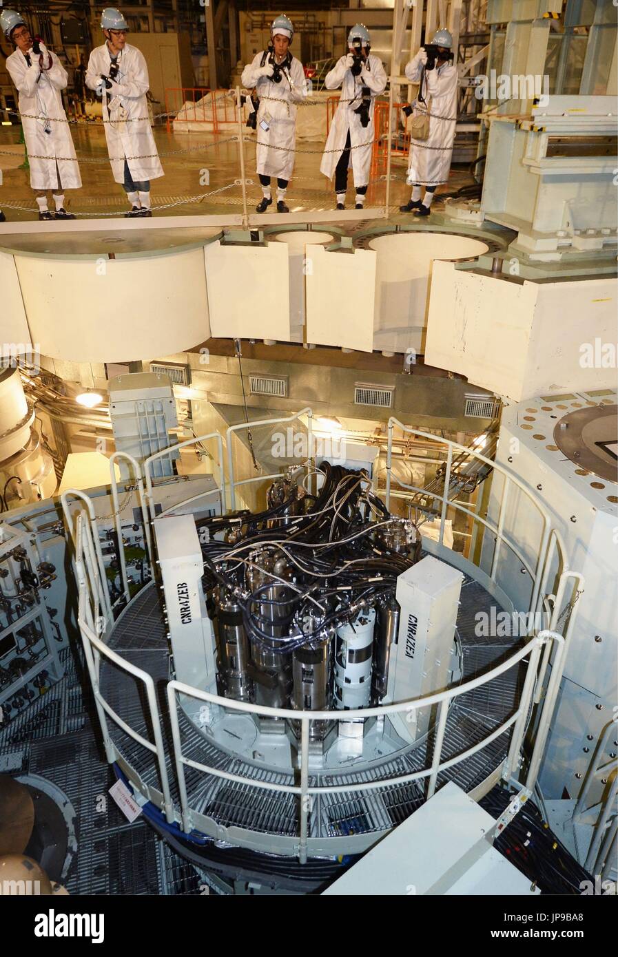 Media personnel tour inside the Monju prototype fast-breeder reactor in ...
