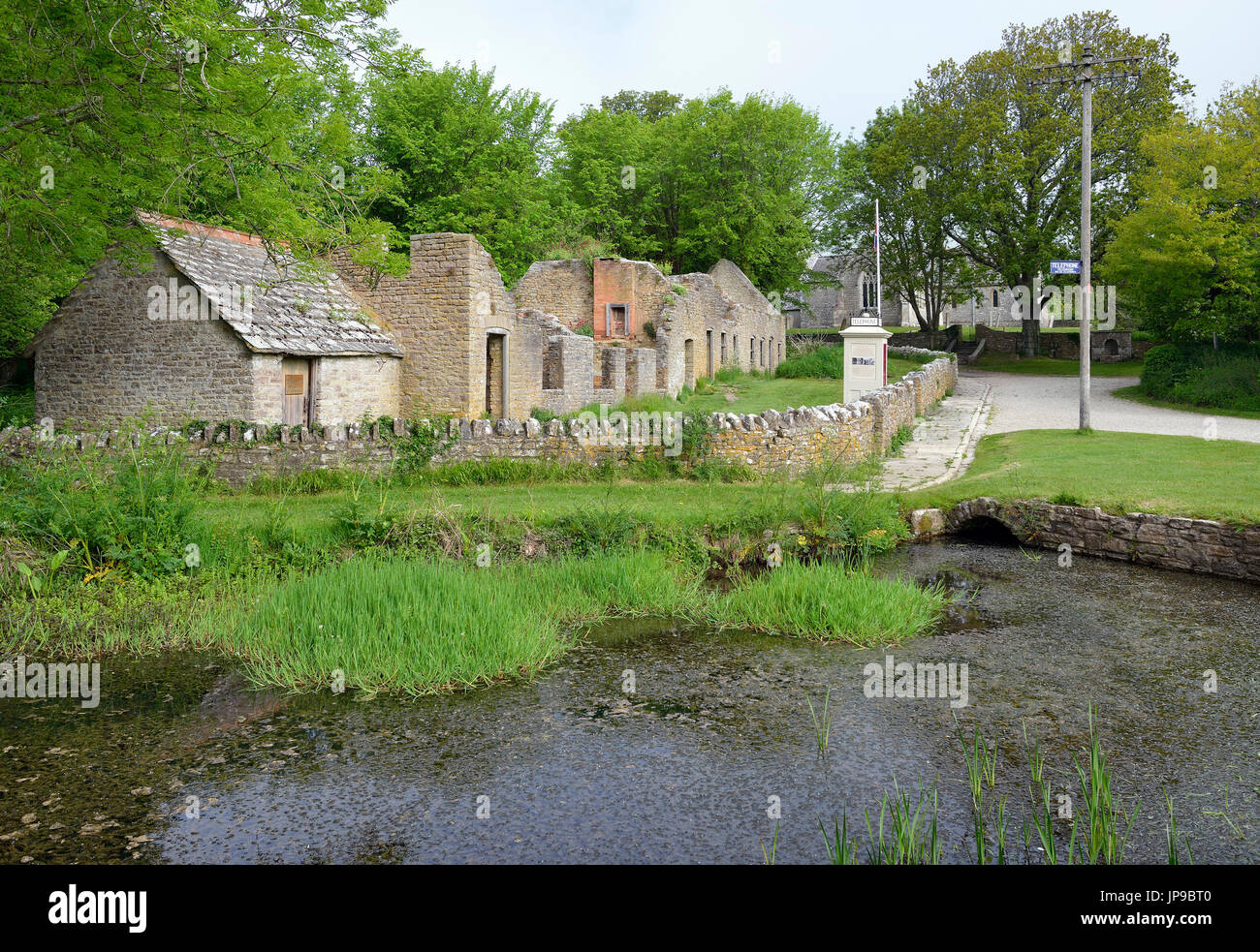 Village Pond & Post Office Row with St Mary's Church behind Tyneham ...