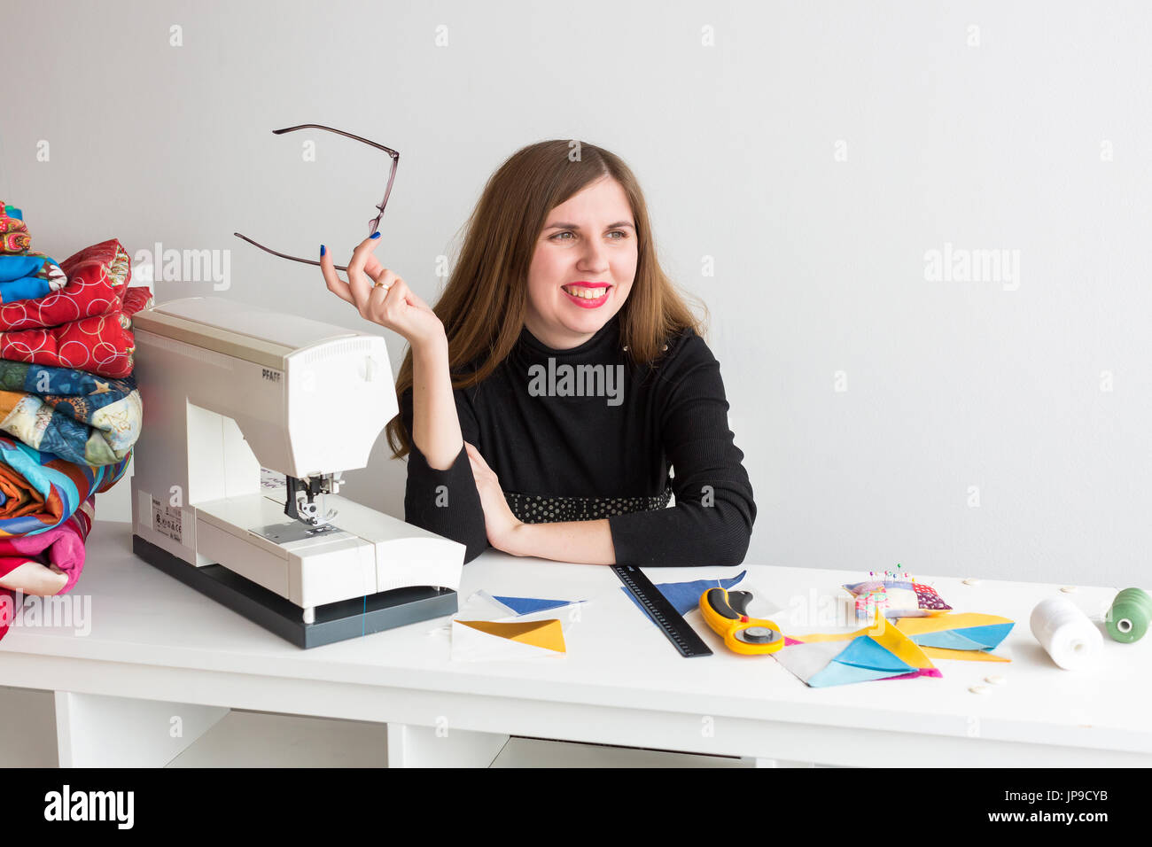 Tailor Woman Behind Sewing Machine High Resolution Stock Photography ...