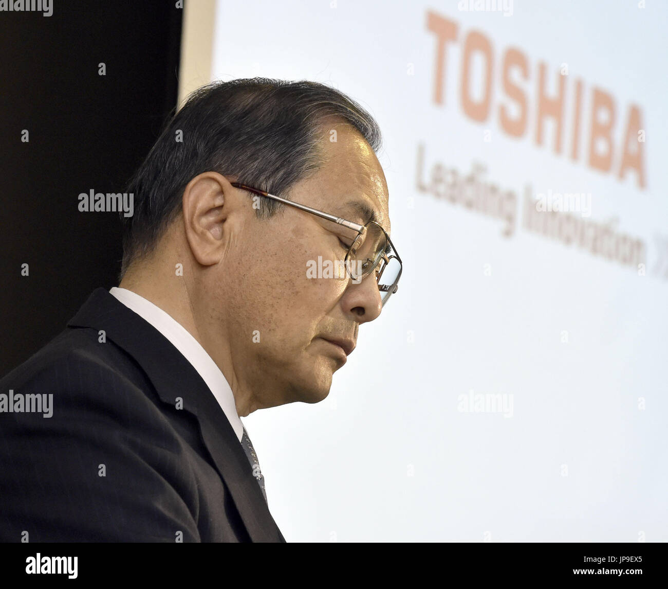 Toshiba Corp. President Masashi Muromachi listens to a reporter's ...
