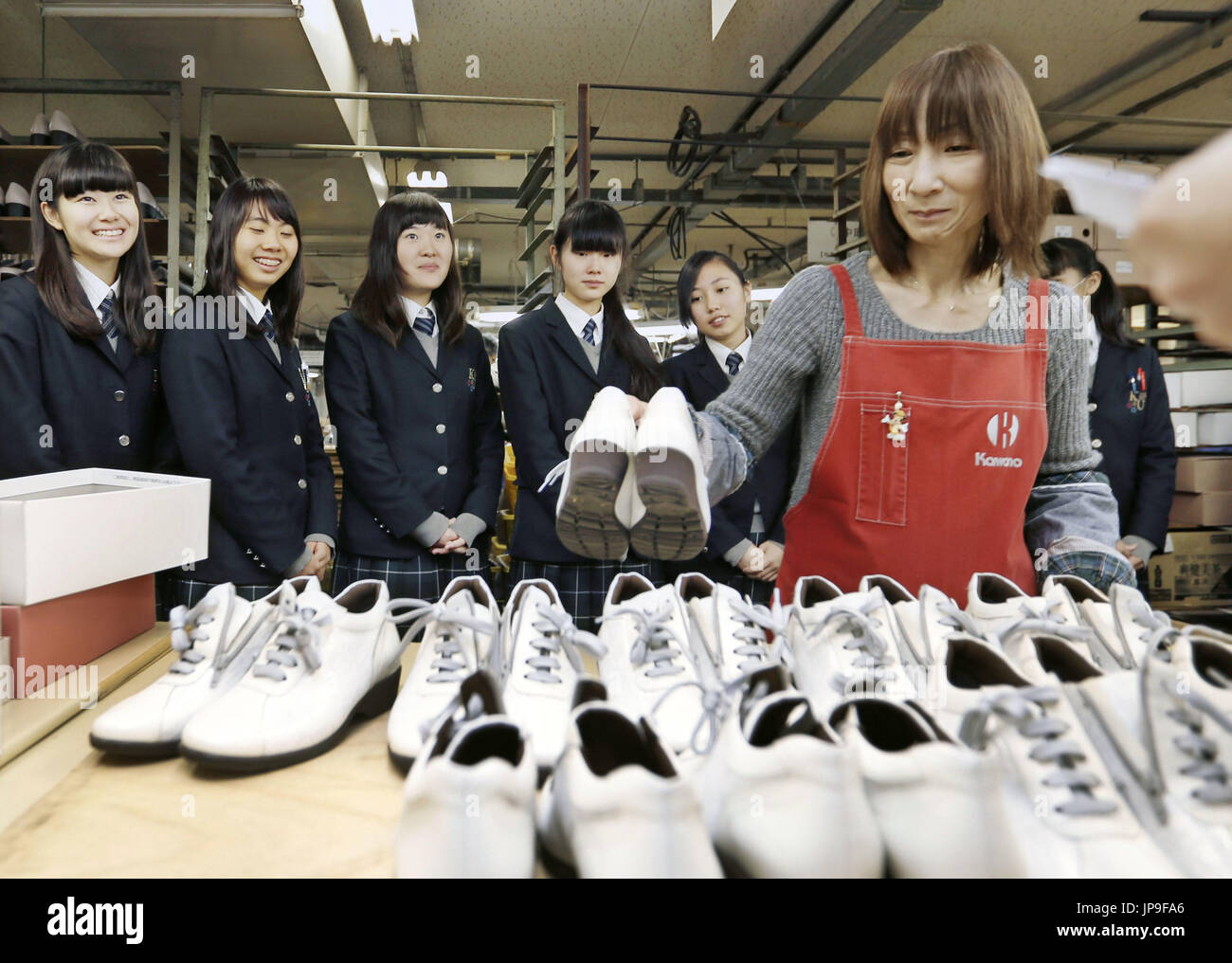 High school students visit a shoe factory in Kobe's Nagata Ward on Dec ...