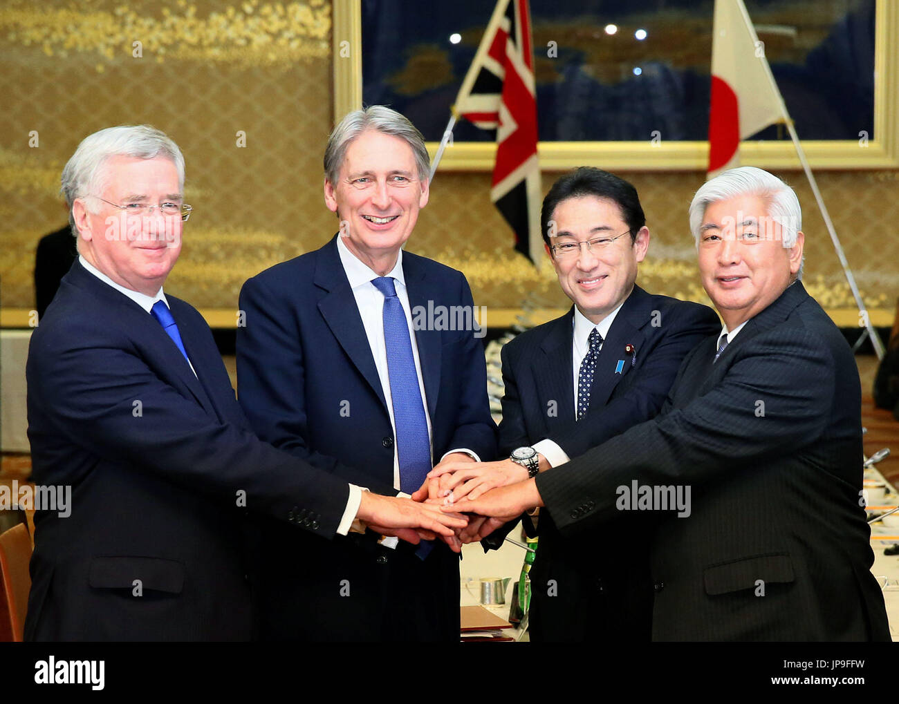 (From L) British Defense Secretary Michael Fallon, Foreign Secretary ...