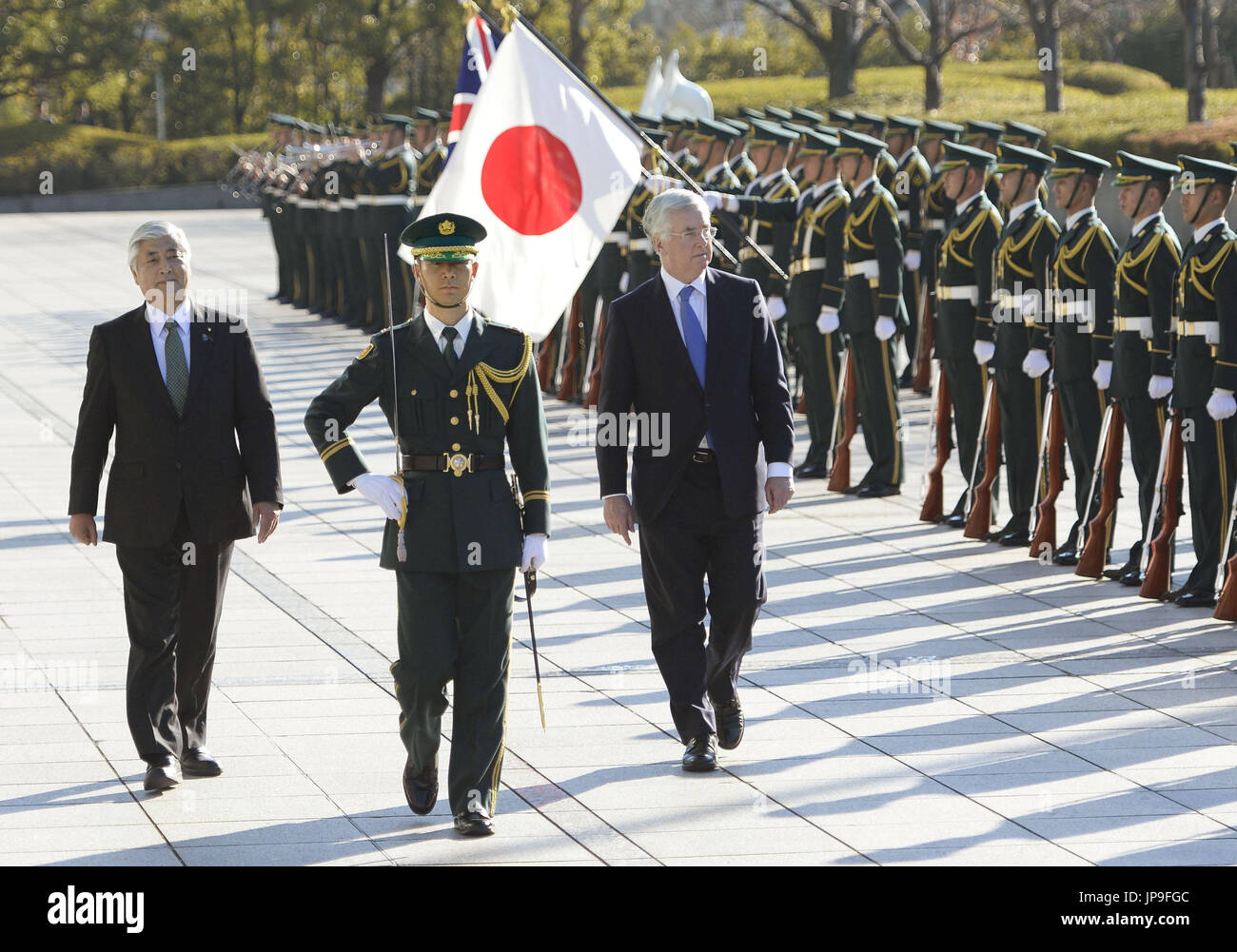 British Defense Secretary Michael Fallon (R), alongside Japanese ...