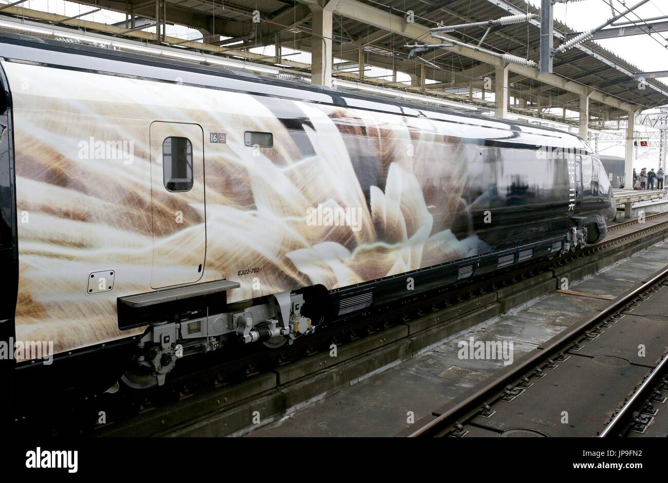 The Genbi Shinkansen, a six-car bullet train adorned with images of ...