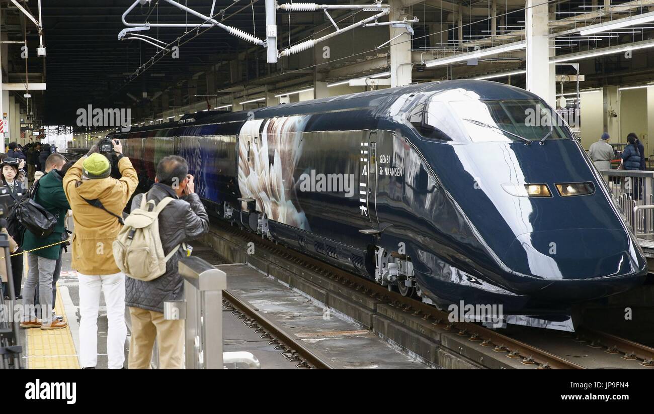 The Genbi Shinkansen, a six-car bullet train adorned with images of ...