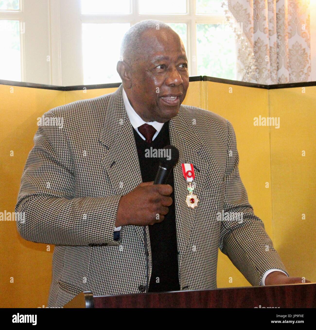 Retired American baseball player Hank Aaron speaks after receiving the ...