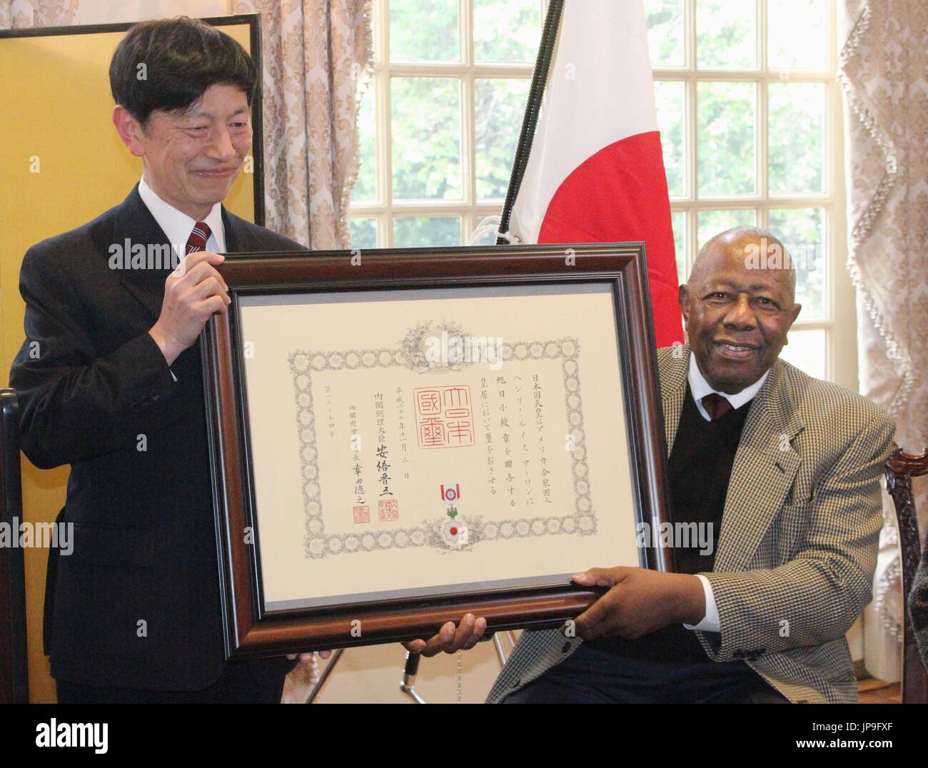 Japanese Consul General Takashi Shinozuka (L) and retired American ...