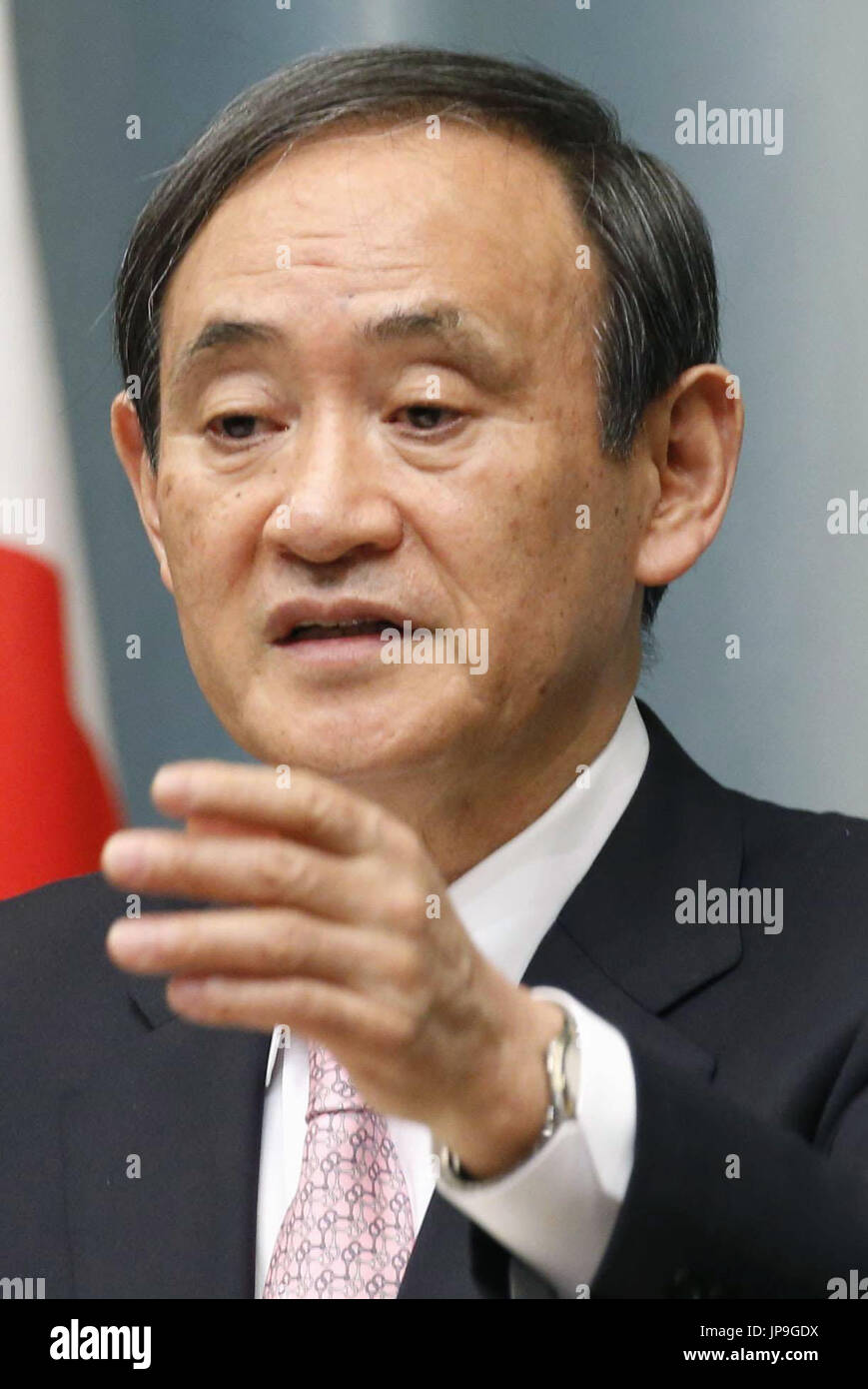 Chief Cabinet Secretary Yoshihide Suga attends a press conference in ...