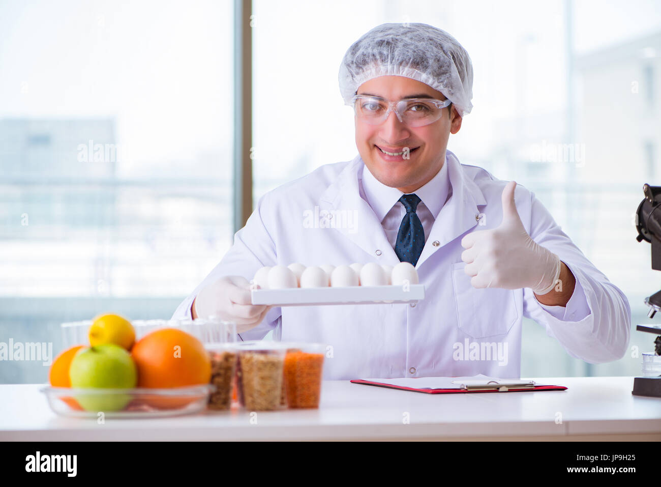 Nutrition expert testing food products in lab Stock Photo - Alamy