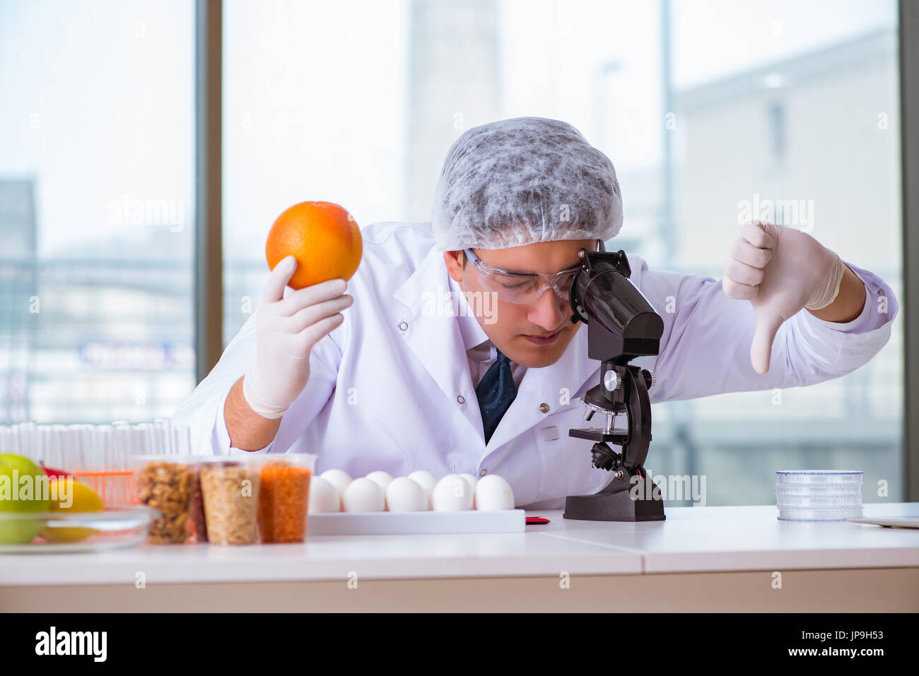 Nutrition expert testing food products in lab Stock Photo - Alamy