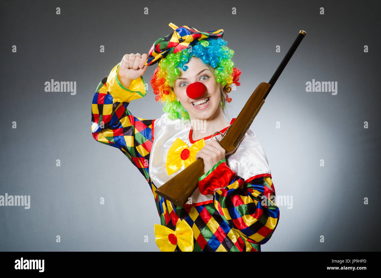 Funny clown in comical concept Stock Photo - Alamy