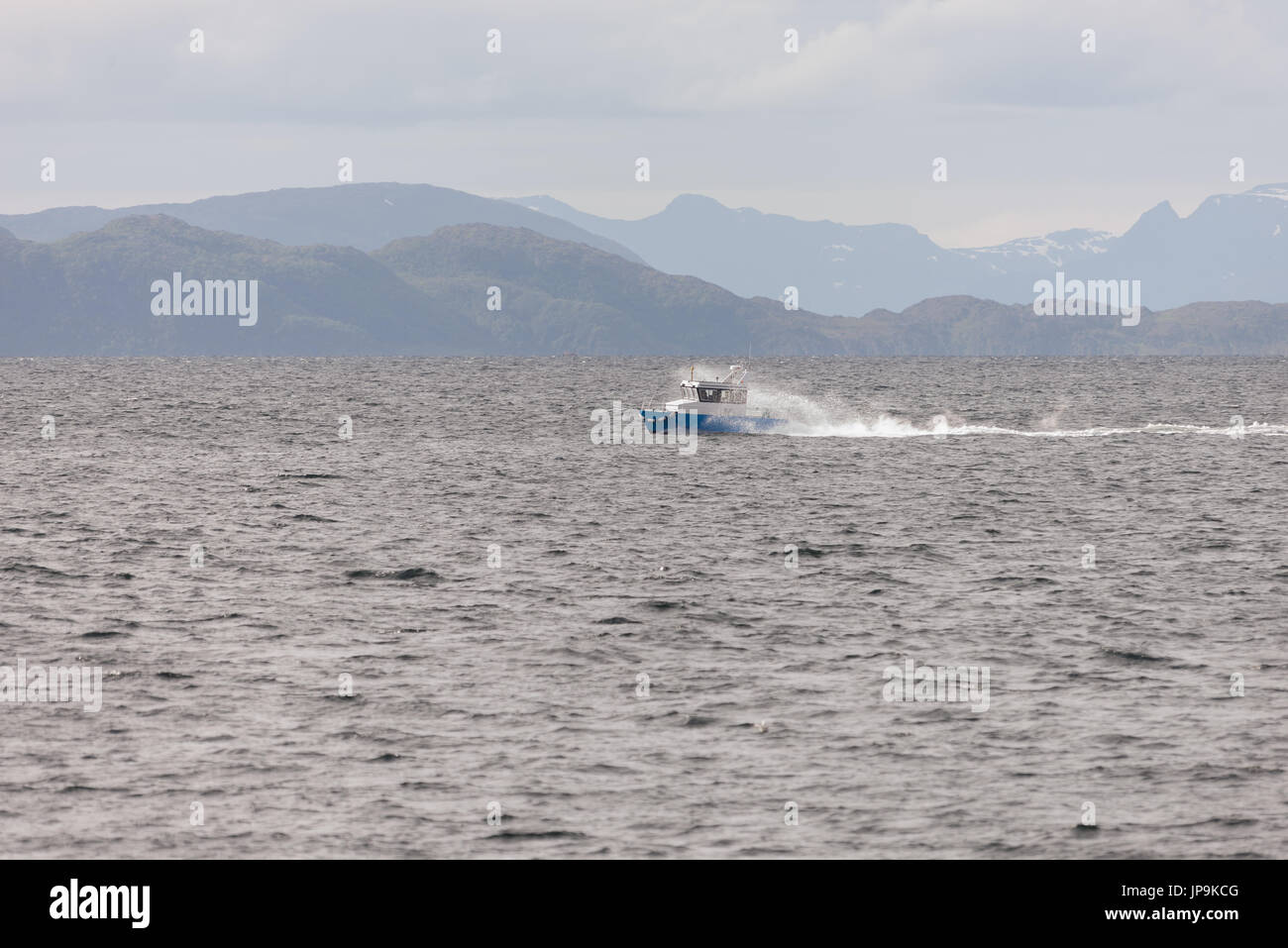 boat blue ocean drive driving Stock Photo - Alamy