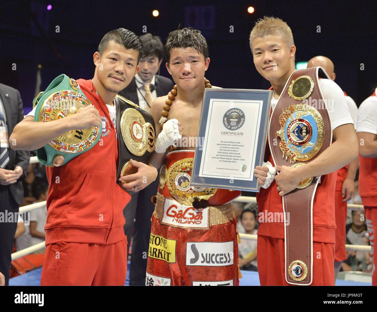 File photo taken in September 2013 shows Japanese boxer Daiki Kameda (C ...