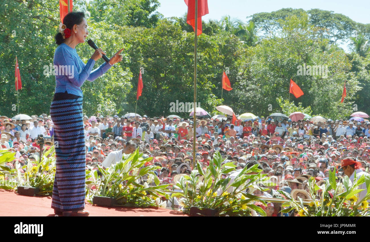 A large crowd of voters listens to Aung San Suu Kyi, leader of Myanmar ...