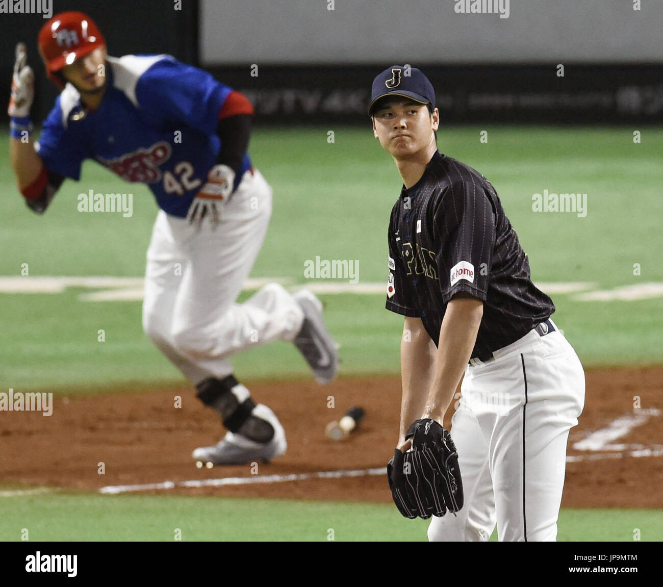 Japan pitcher Shohei Otani looks on after Puerto Rico's Jay Gonzalez ...