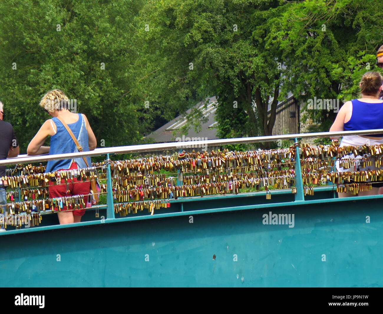 Padlocks secured to railing Stock Photo - Alamy
