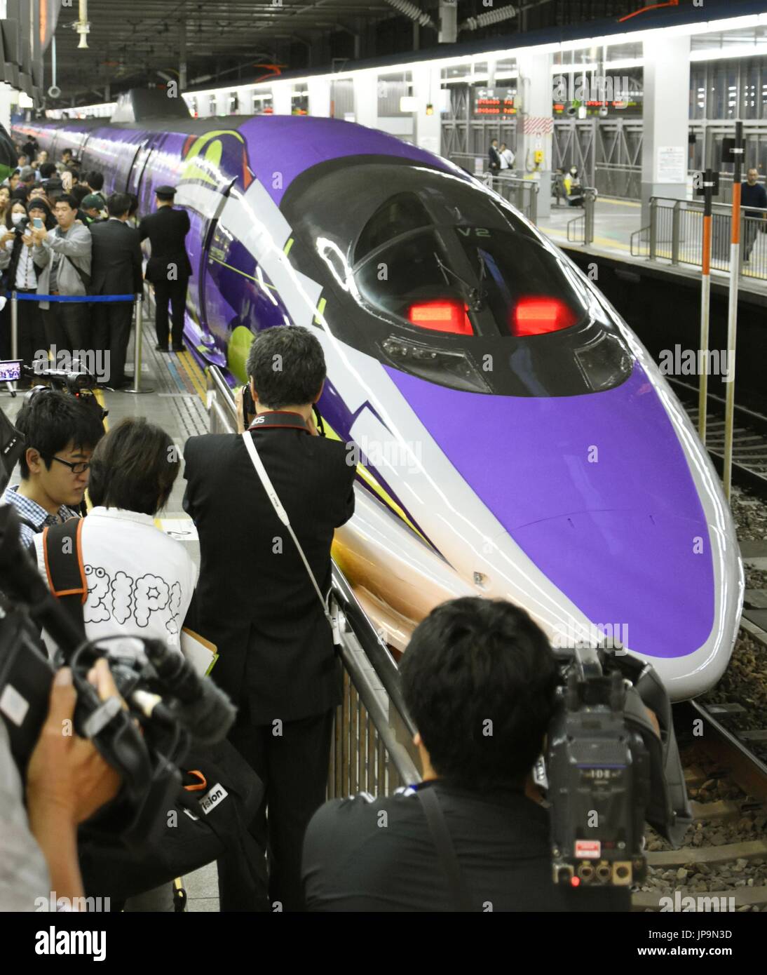 People crowd a platform at JR Hakata Station in southwestern Japan to ...