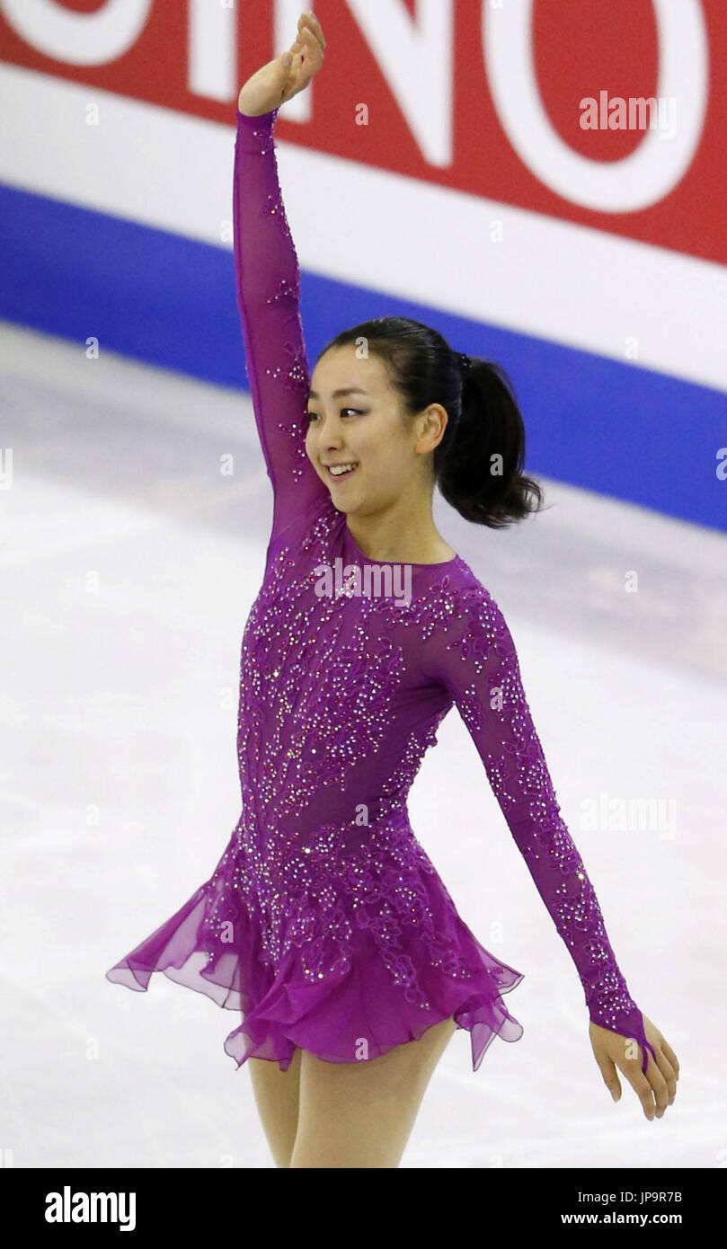 Japan's Mao Asada acknowledges the spectators after performing in the ...