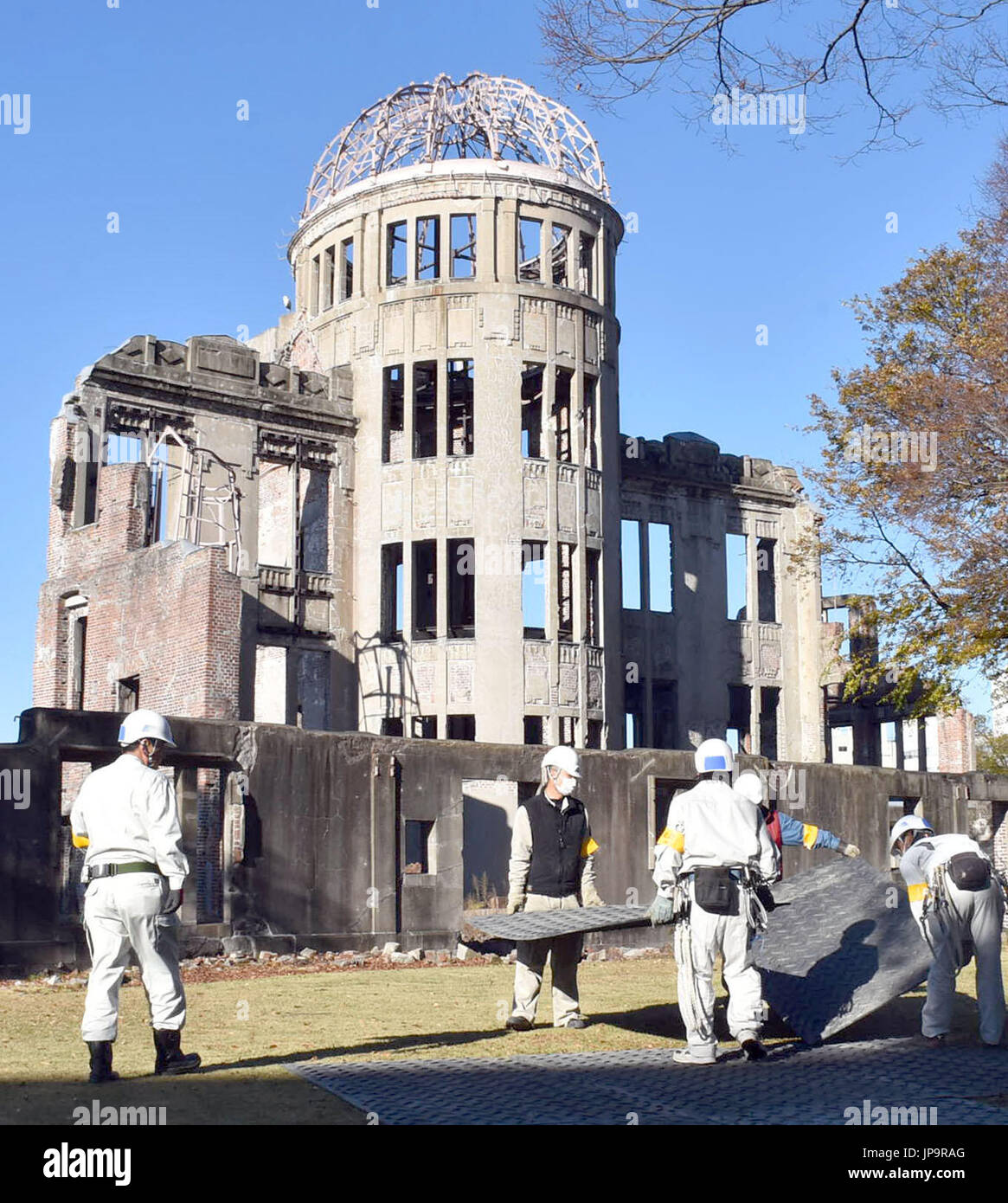 Workers prepare for seismic strengthening work on the Atomic Bomb Dome ...