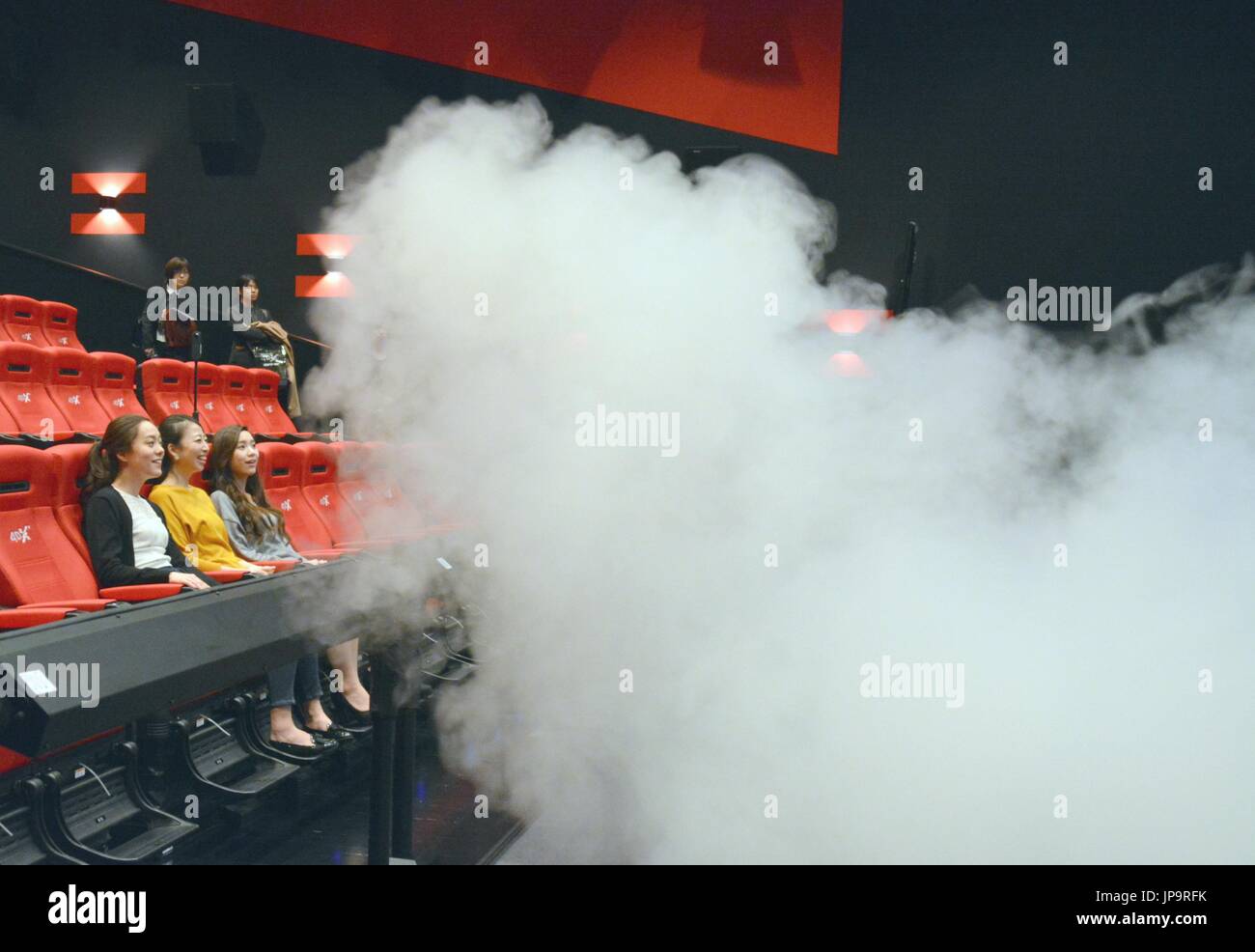 Smoke engulfs a theater at Kanazawa Korona Cinema World, a movie ...