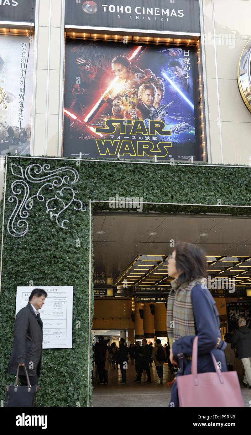 People walk by a movie theater in Tokyo on Dec. 18, 2015. "Star Wars ...