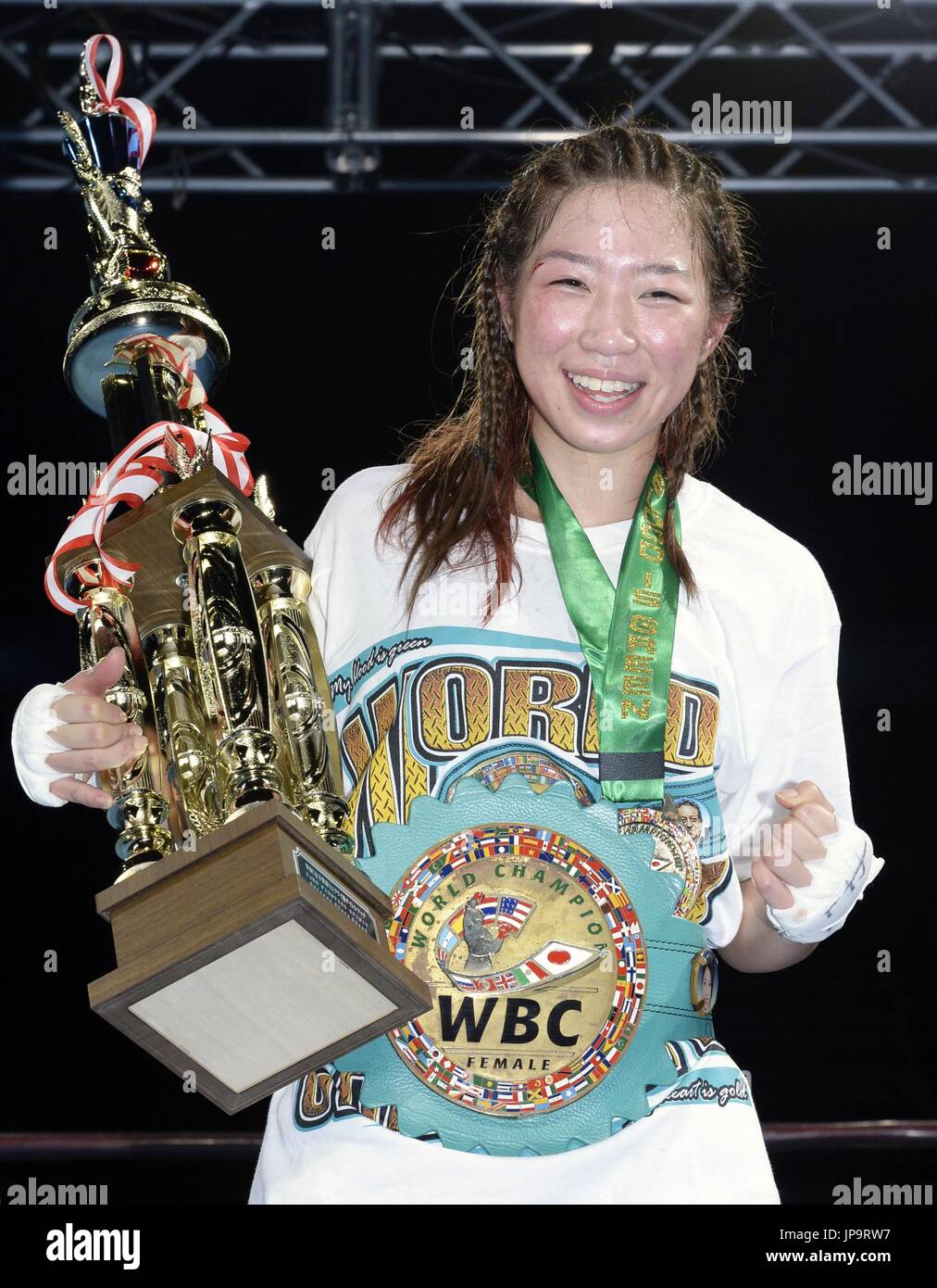 Yuko Kuroki of Japan celebrates with her trophy after beating Nancy ...