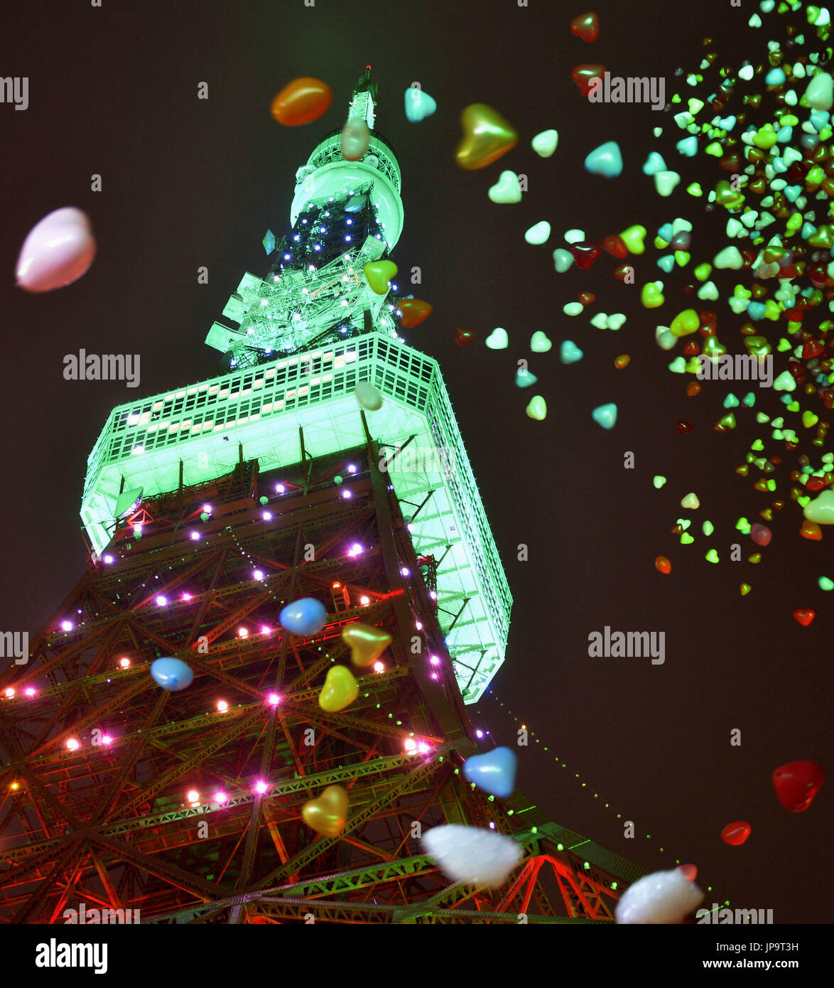 Heart-shaped balloons fly around the 333-meter-high Tokyo Tower while ...