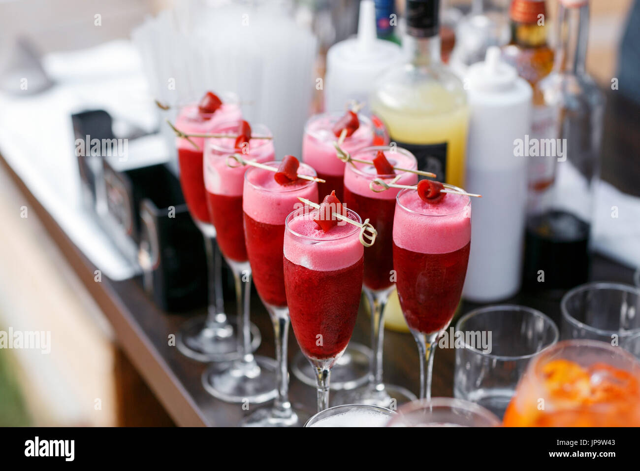 Strawberry alcoholic cocktail drinks and fruit Stock Photo - Alamy