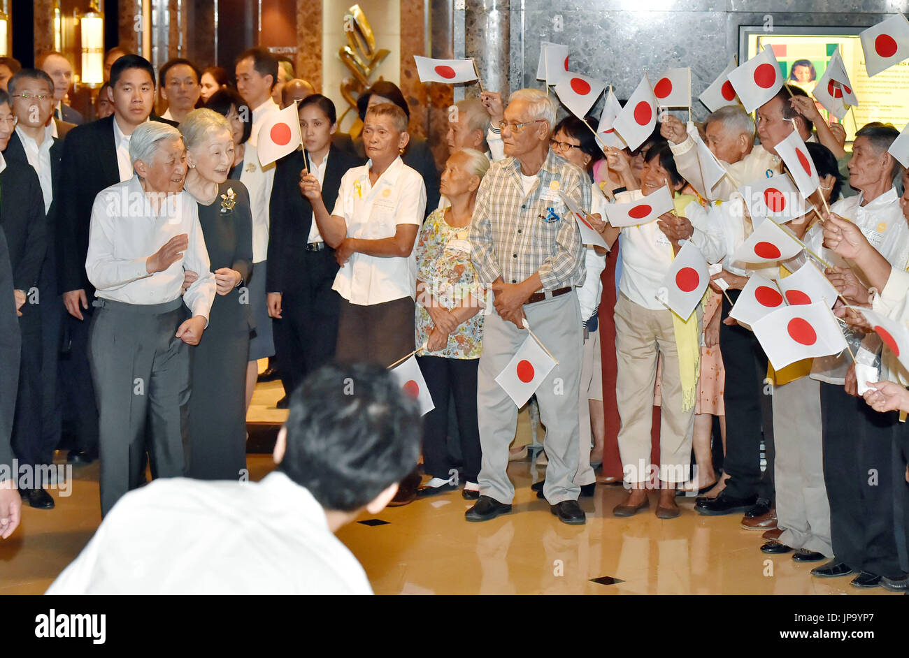 Japanese Emperor Akihito and Empress Michiko (L side) meet with ...