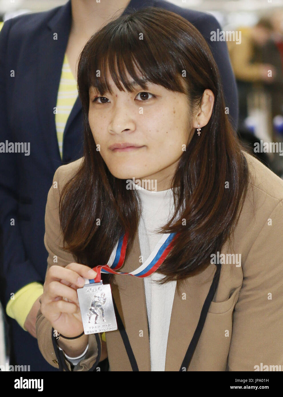Ten-time world champion Kaori Icho shows her silver medal on Feb. 1 ...