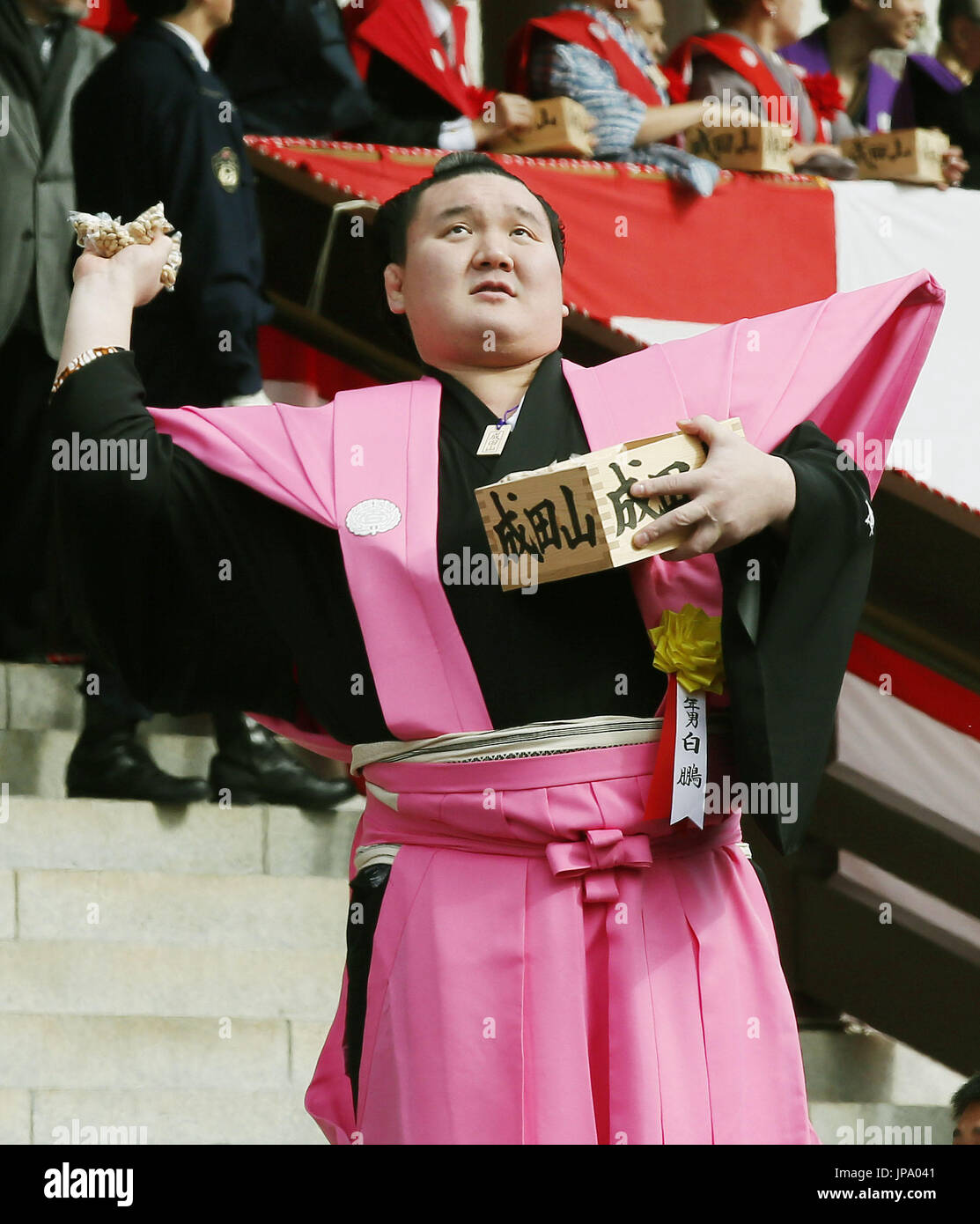 Sumo grand champion Hakuho scatters dried beans, a Japanese tradition ...