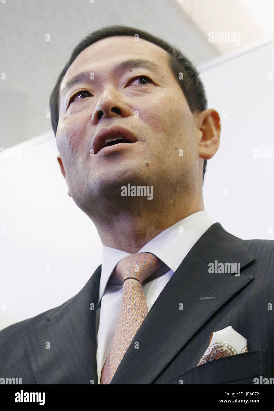 Former Yomiuri Giants pitcher Masumi Kuwata speaks to reporters in ...