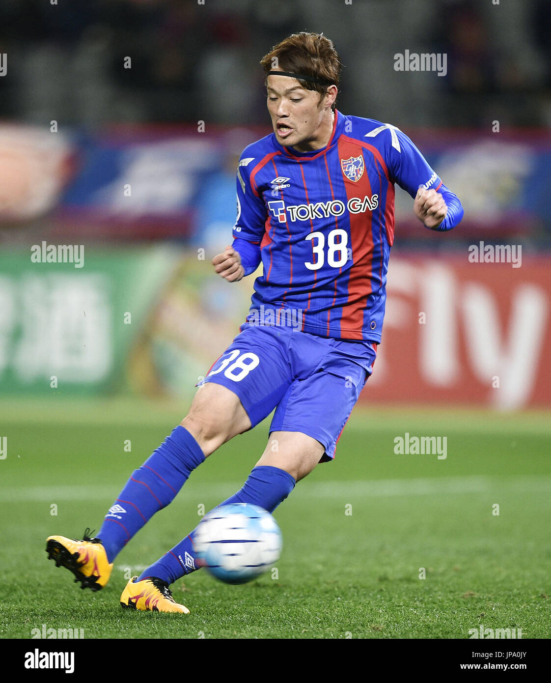Midfielder Keigo Higashi of Japan's FC Tokyo scores his side's third ...