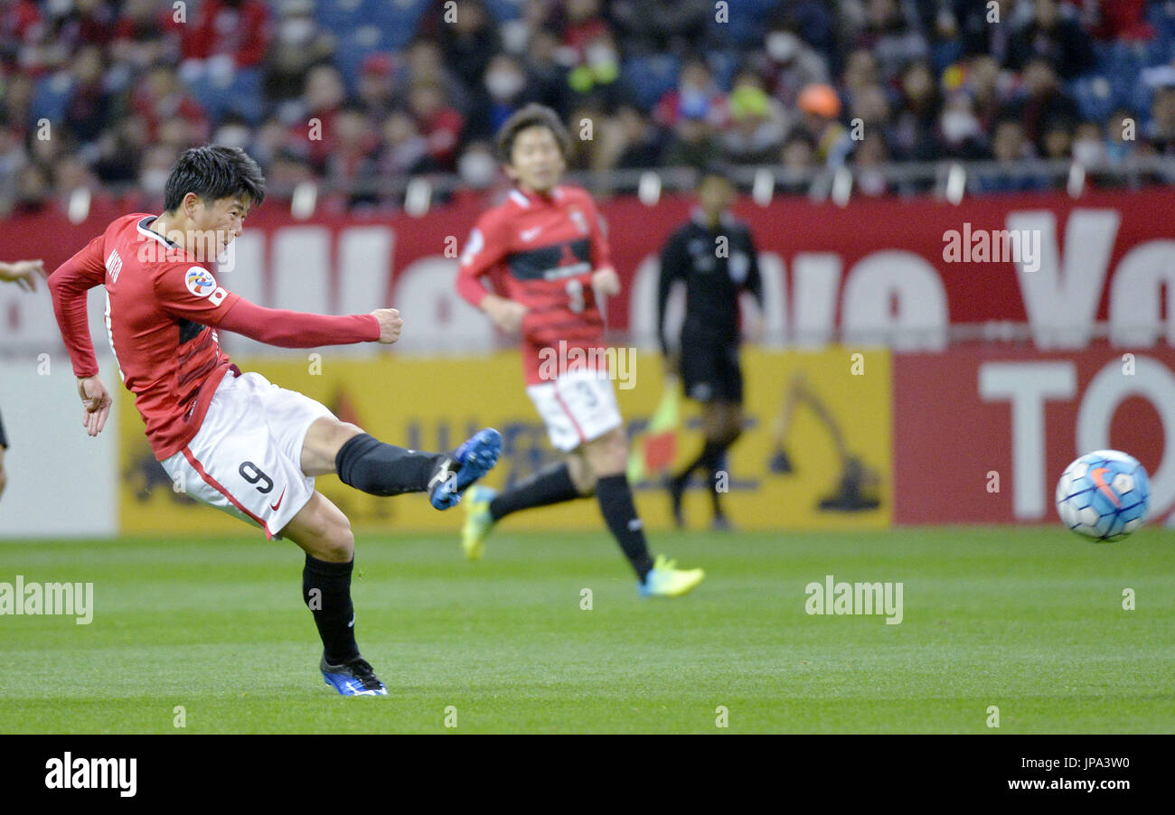 Striker Yuki Muto of Japan's Urawa Red Diamonds shoots during the first ...