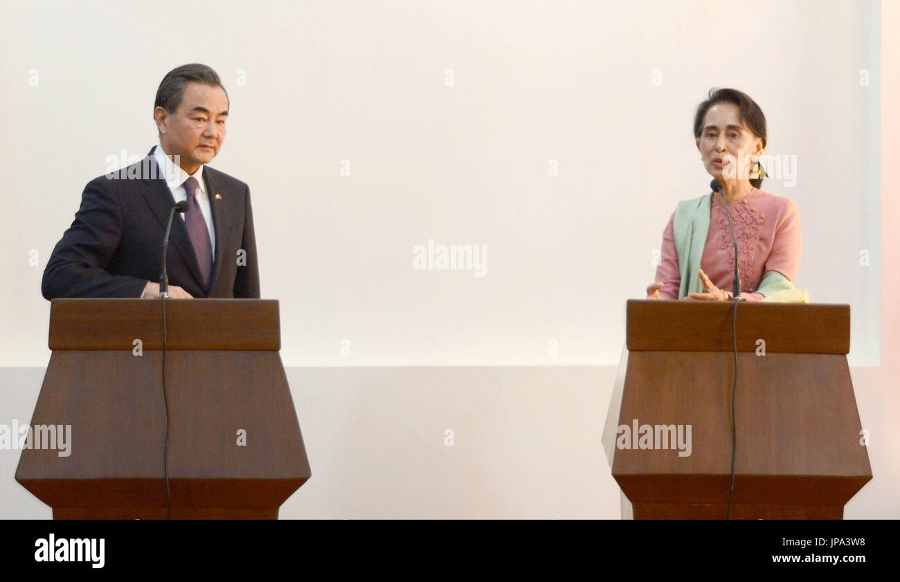 China's Foreign Minister Wang Yi (L) attends a joint press conference ...