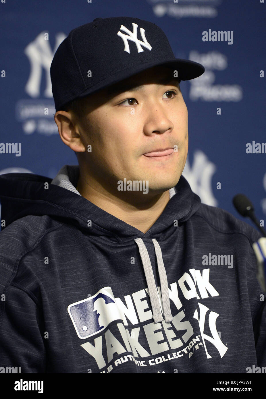 New York Yankees pitcher Masahiro Tanaka looks downcast during a press conference following the ...