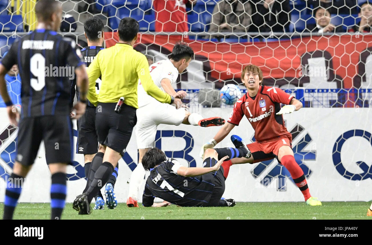 Gamba Osaka goalkeeper Masaaki Higashiguchi (1) concedes the opening ...