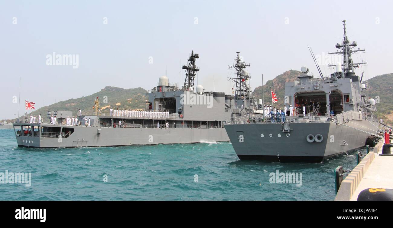 The Japanese Maritime Self-Defense Force destroyers Ariake (R) and ...