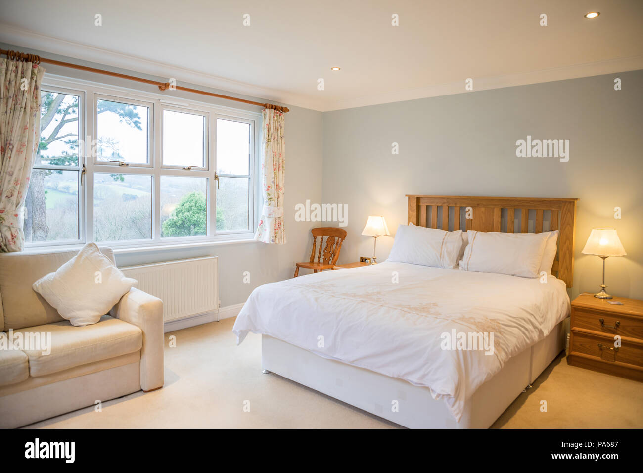 A bedroom in a house Stock Photo - Alamy