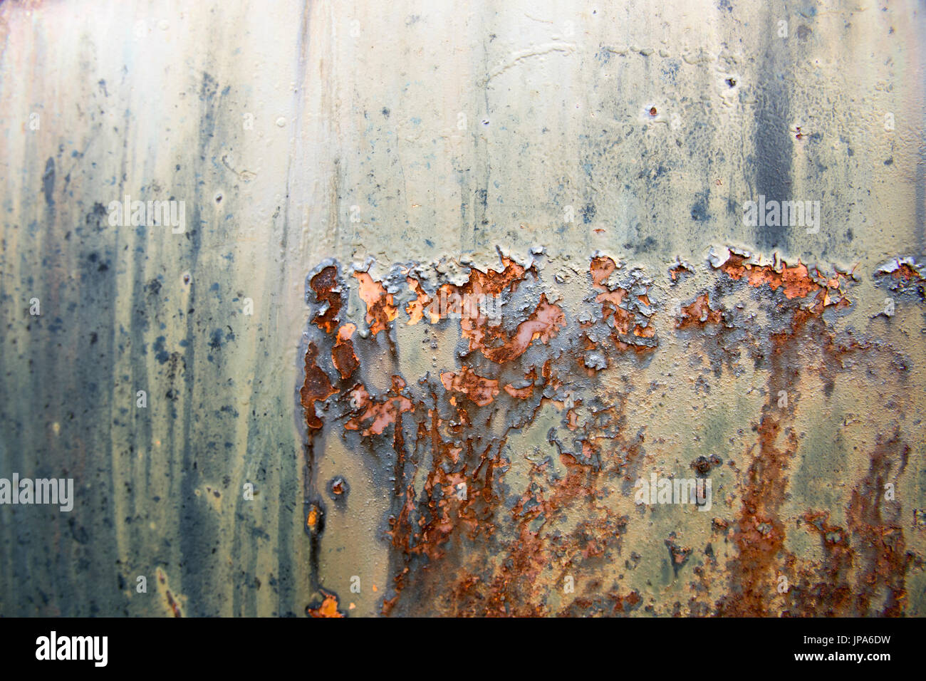 Abstract grunge texture of painted rusting metal surface Stock Photo ...